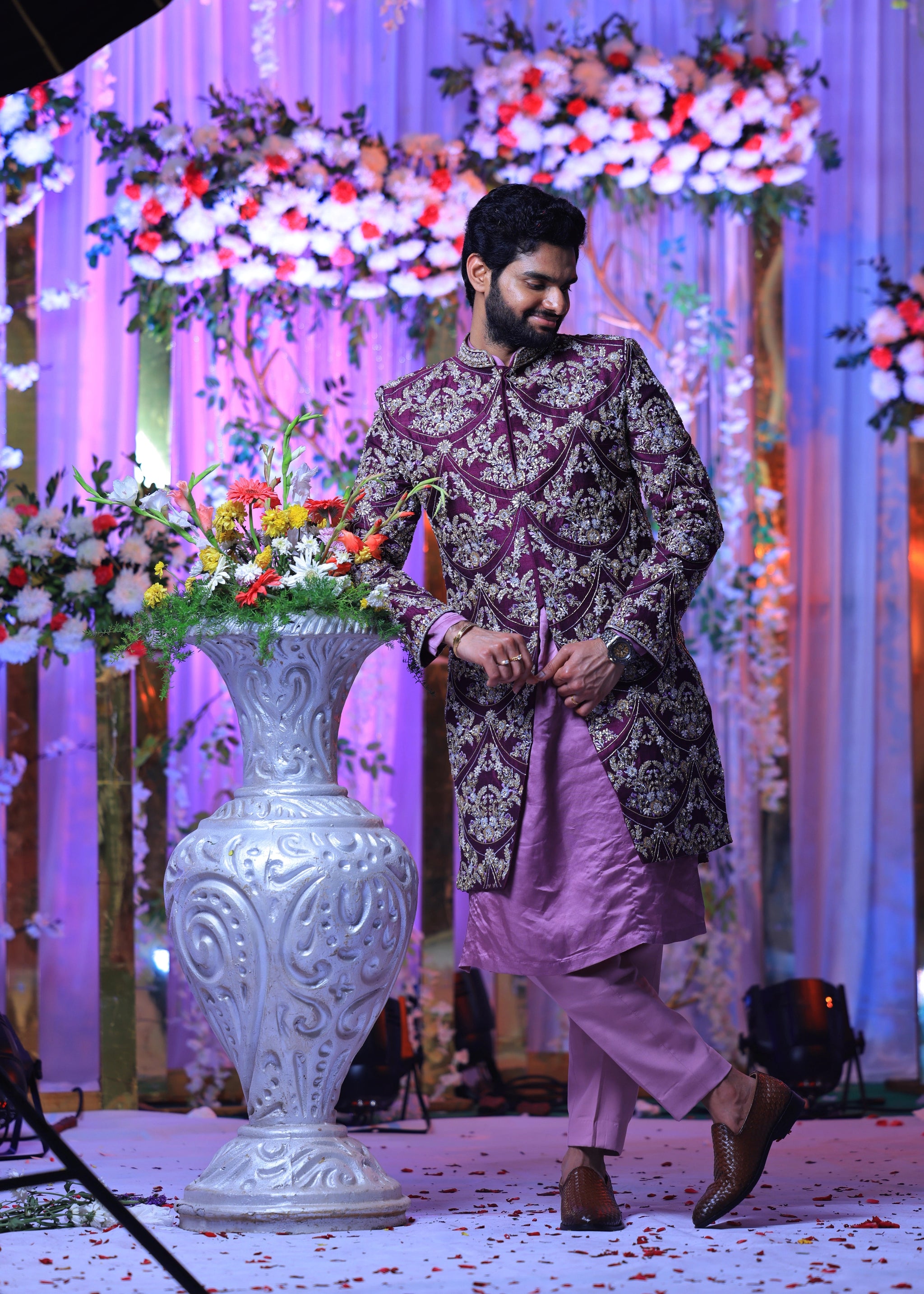 Groom from Canada in handcrafted purple sherwani by Archana Karthick
